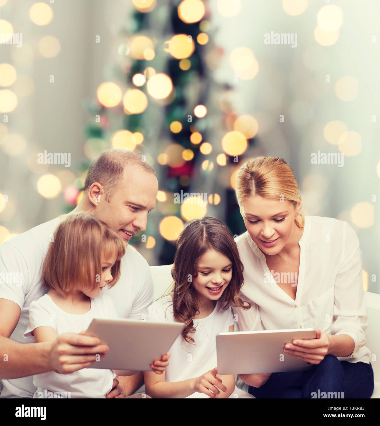 happy family with tablet pc computers Stock Photo - Alamy
