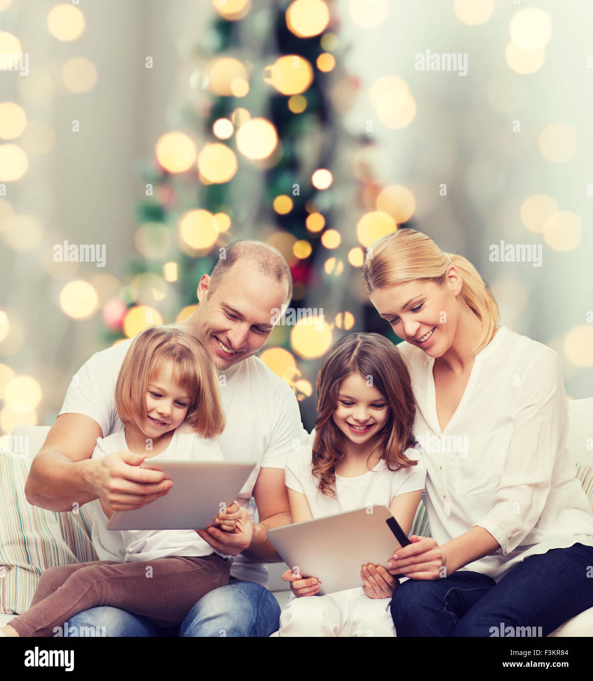 happy family with tablet pc computers Stock Photo - Alamy