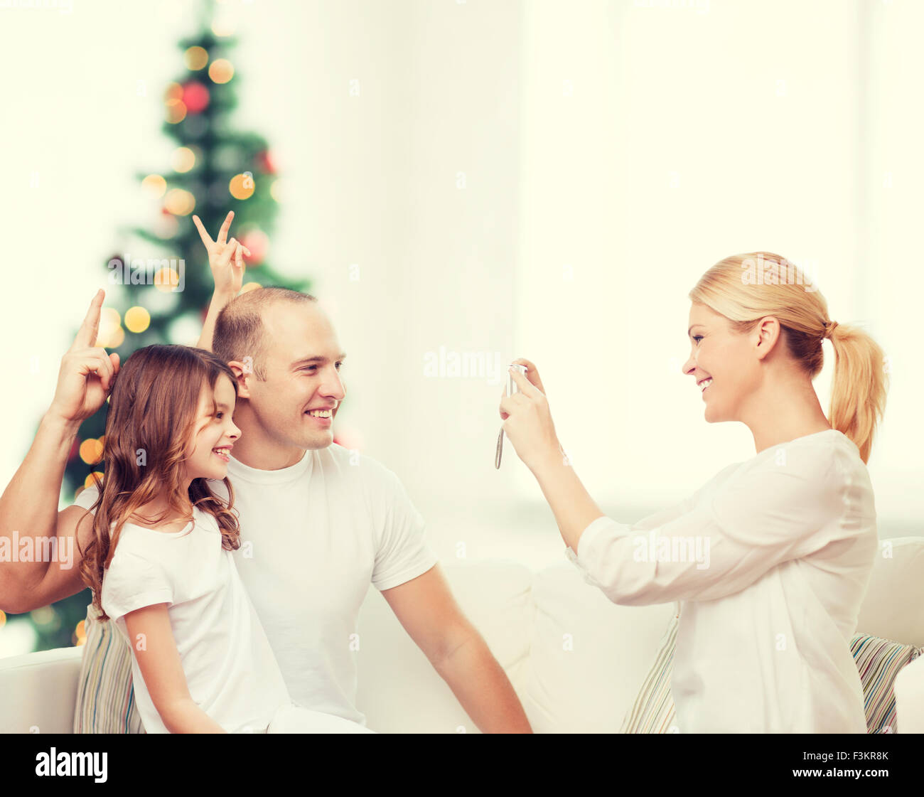 happy family with camera at home Stock Photo - Alamy