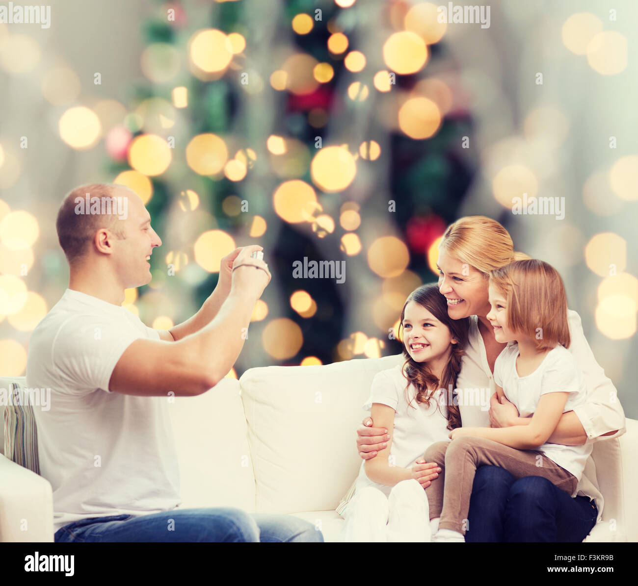 happy family with camera at home Stock Photo - Alamy