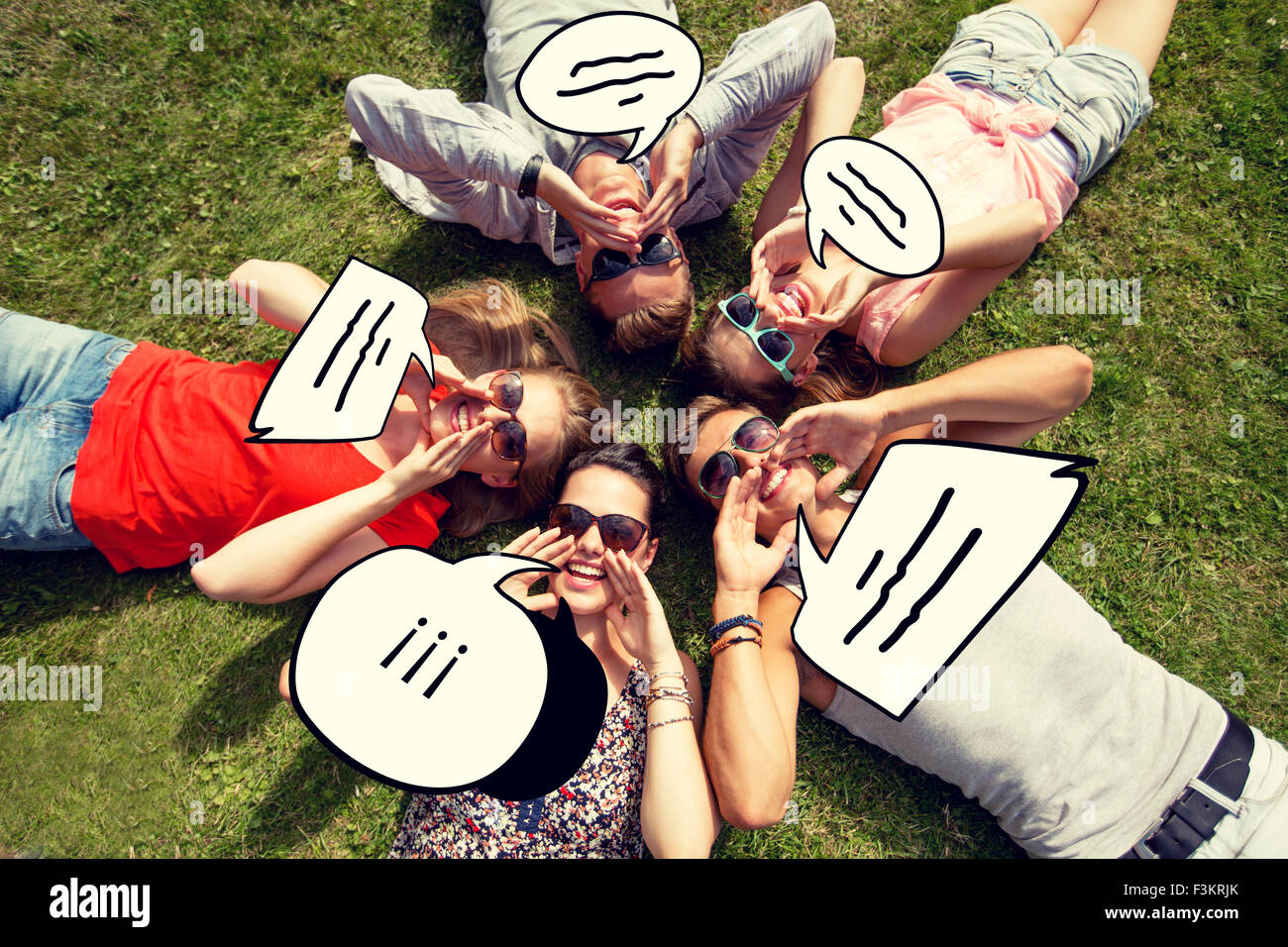 Smiling friends chatting outdoors hi-res stock photography and images ...