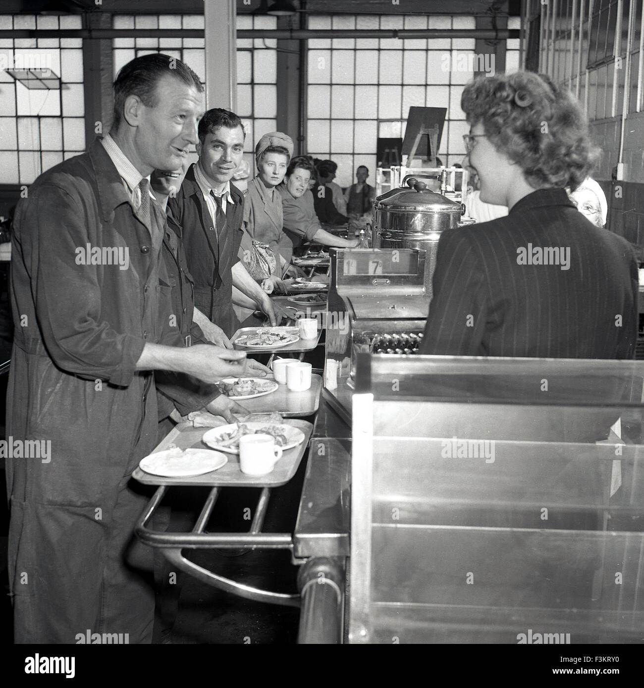 Historical, 1950s, workers of the Ever Ready Battery factory in the ...