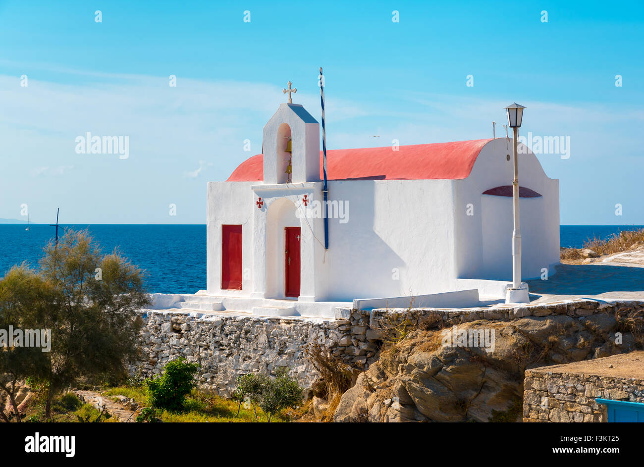 small greek orthodox chapel at the seaside in mykonos Stock Photo - Alamy