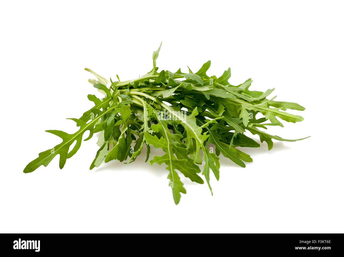 Arugula leaves isolated on white Stock Photo - Alamy