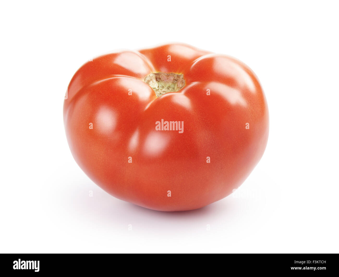 ripe beef tomato isolated Stock Photo - Alamy