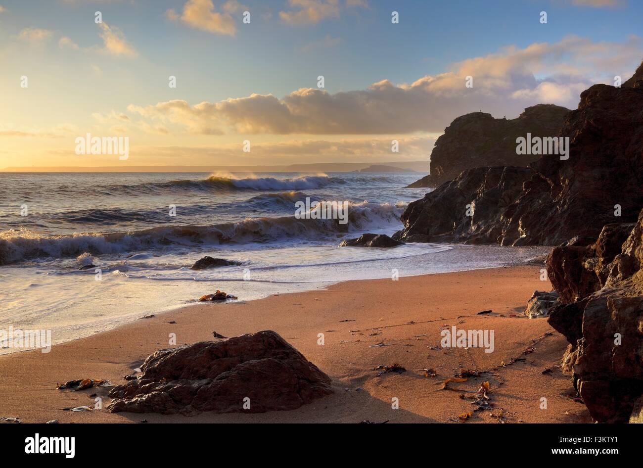 The sun setting at Hope Cove, Devon, England Stock Photo - Alamy