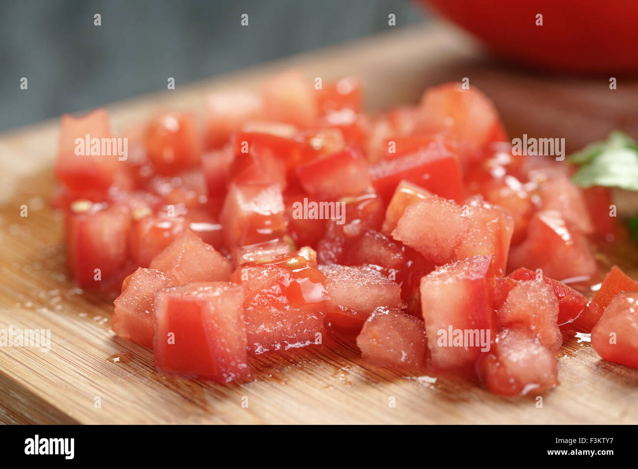 chopped tomato on cutting board Stock Photo - Alamy