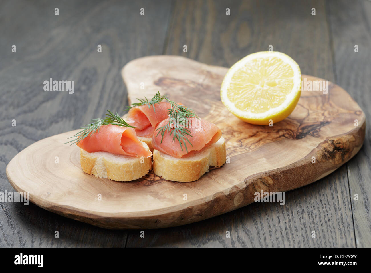 canapes with salmon, dill and lemon Stock Photo - Alamy
