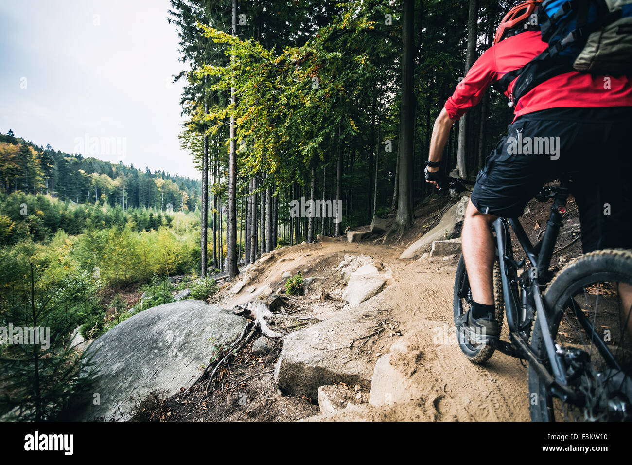 Mountain biker riding on bike in autumn inspirational mountains ...