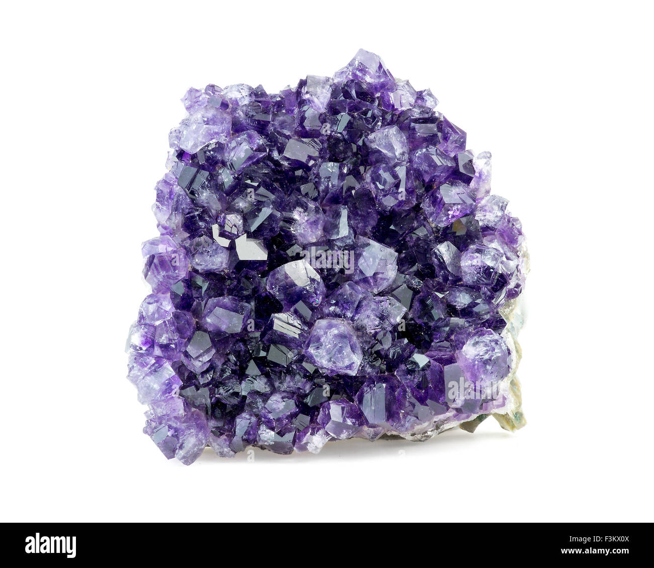 Purple amethyst geode on white background Stock Photo - Alamy