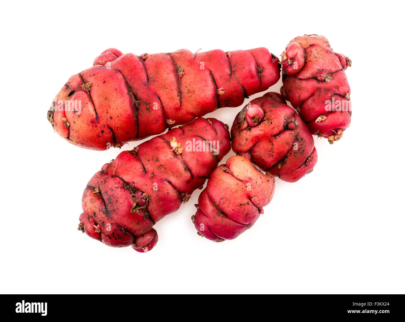 Group of new zealand pink oca yams studio isolated Stock Photo - Alamy