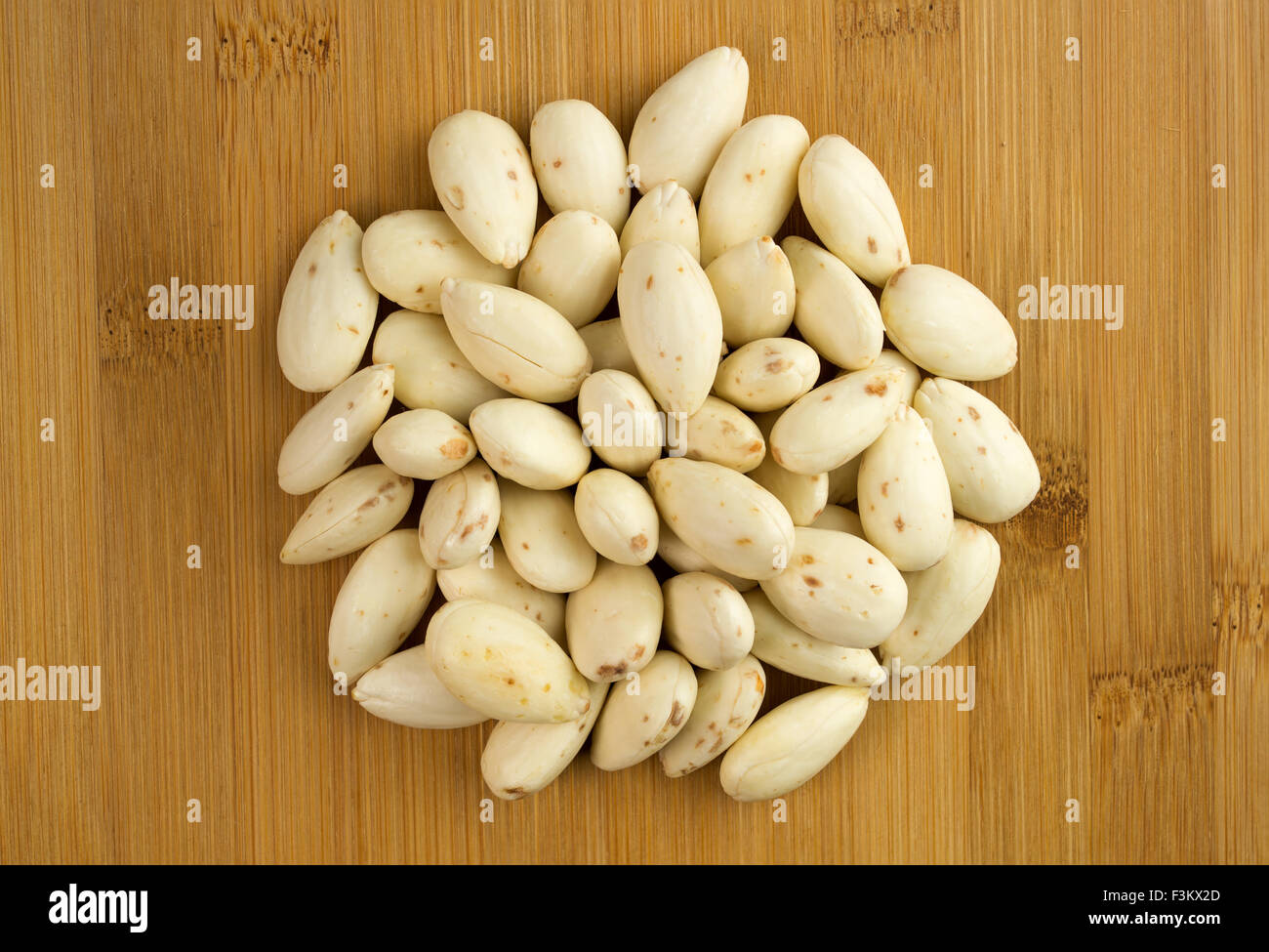 Round pile of peeled almonds after being soaked overnight Stock Photo ...