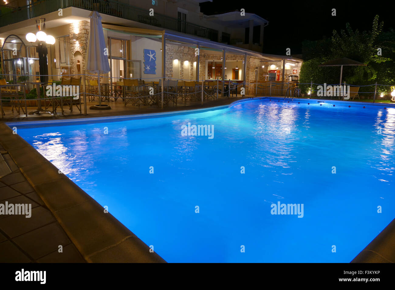 pool night hotel Greece Stock Photo - Alamy