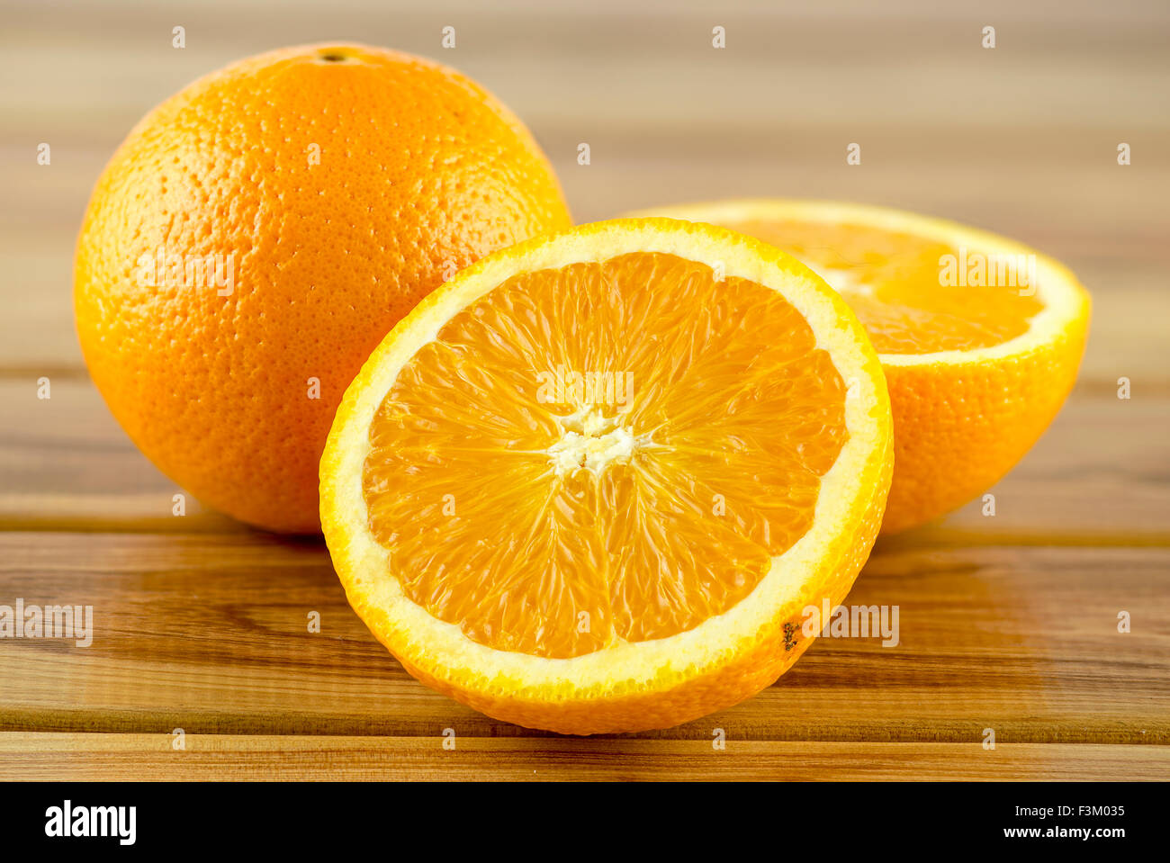 Orange halves hi-res stock photography and images - Alamy
