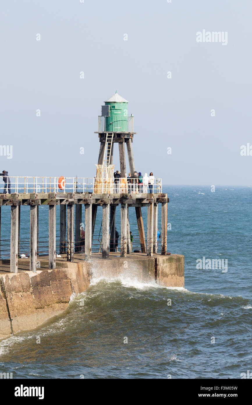 looking out to the North sea and west pier at Whitby, North Yorkshire ...