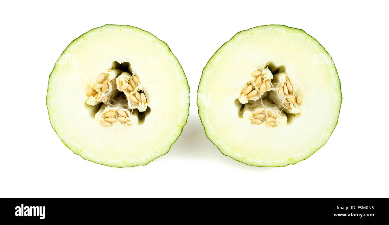 Sliced halves of delicious christmas melon Stock Photo - Alamy
