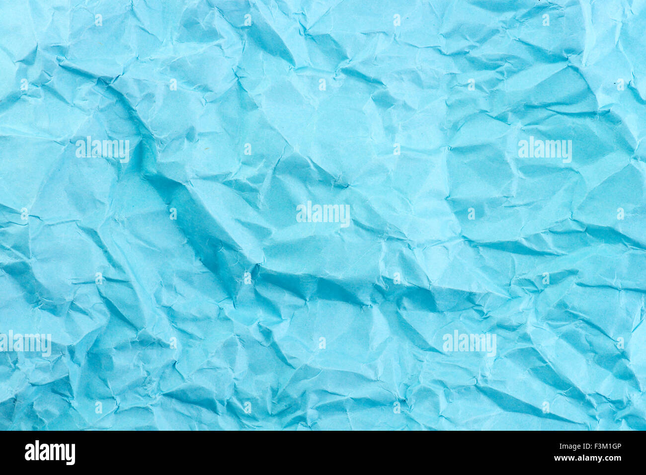 Weathered, folded and crumpled blue paper background texture Stock ...