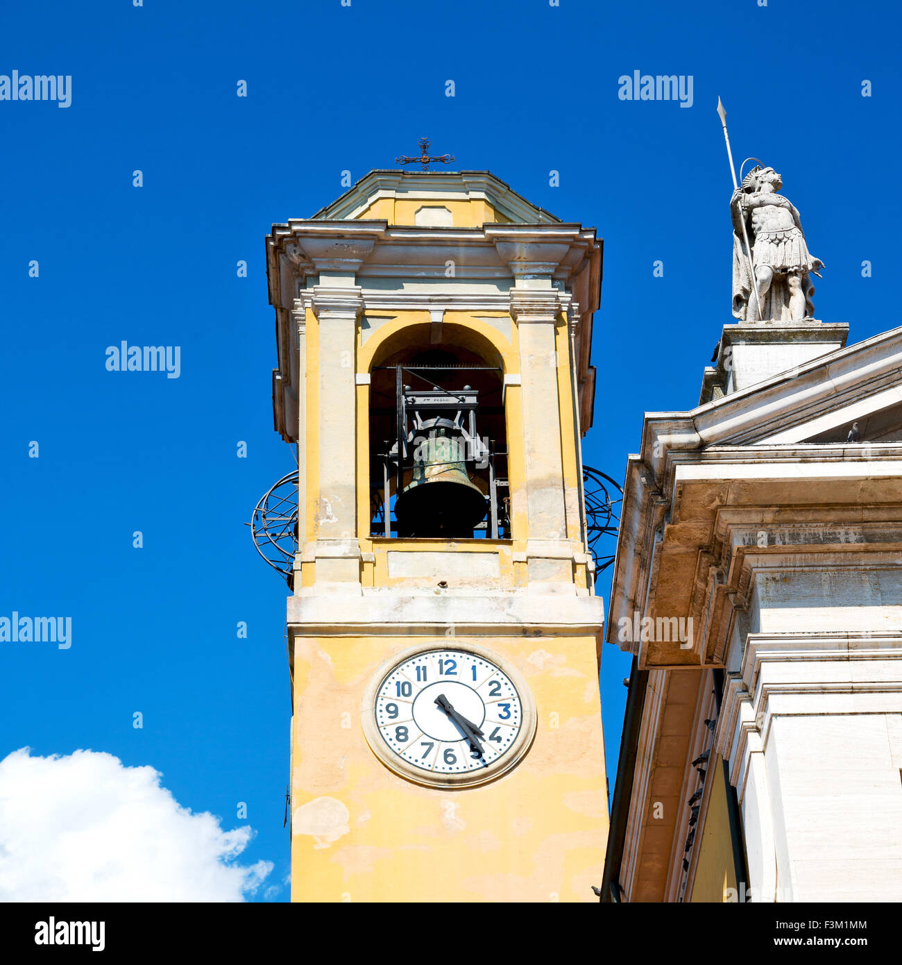 ancien clock tower in italy europe old stone and bell Stock Photo - Alamy