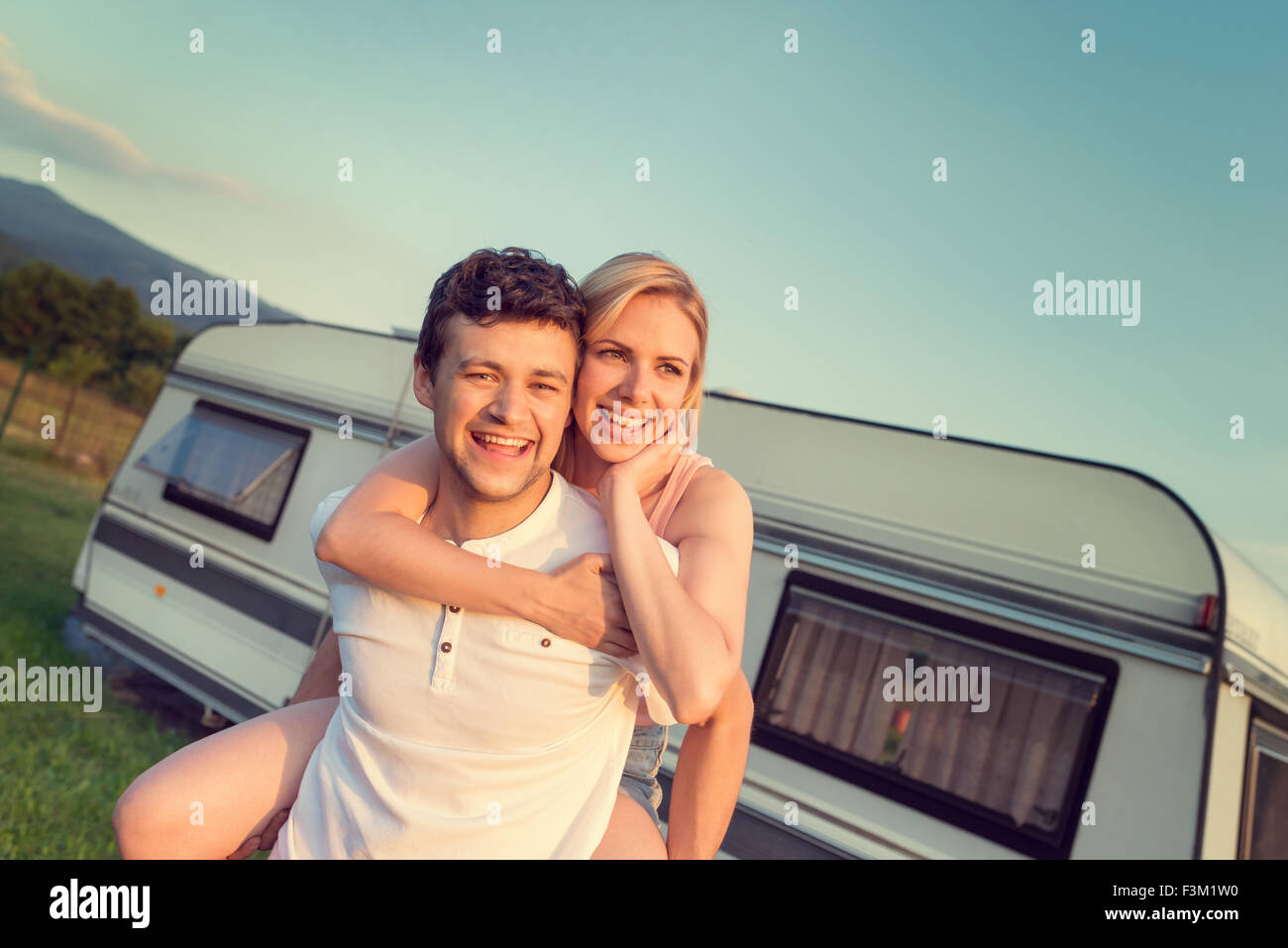 Couple by campervan hi-res stock photography and images - Alamy