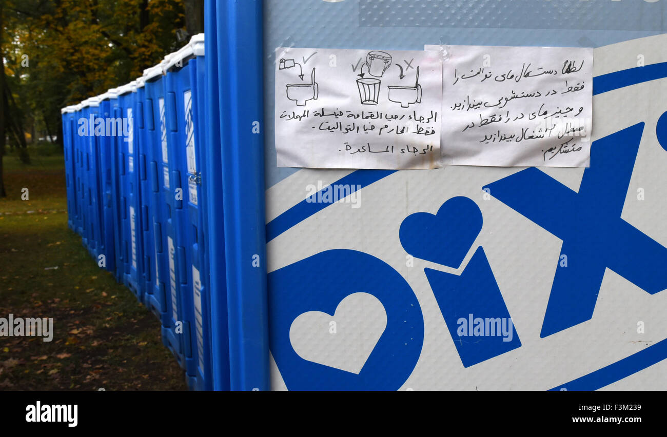 Potsdam, Germany. 9th Oct, 2015. A sign in Arabic indicating how to use ...
