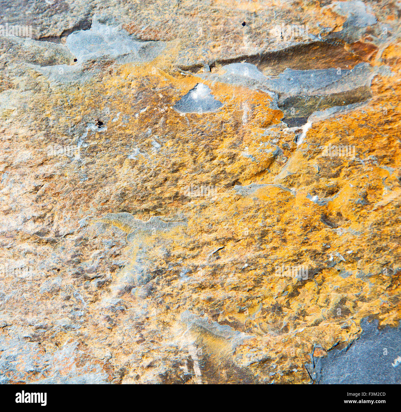 rocks stone and red orange gneiss in the wall of morocco Stock Photo ...