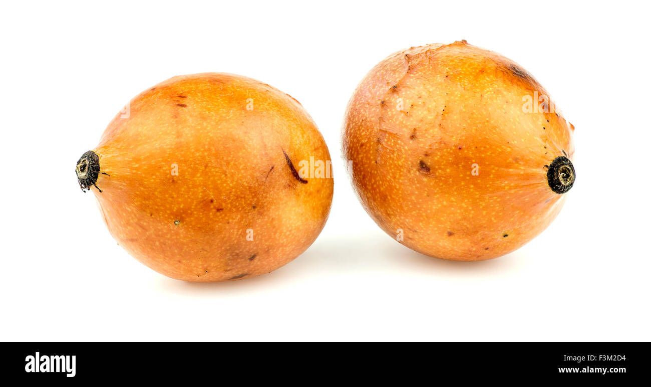 Pair of achacha fruits isolated on white background Stock Photo - Alamy