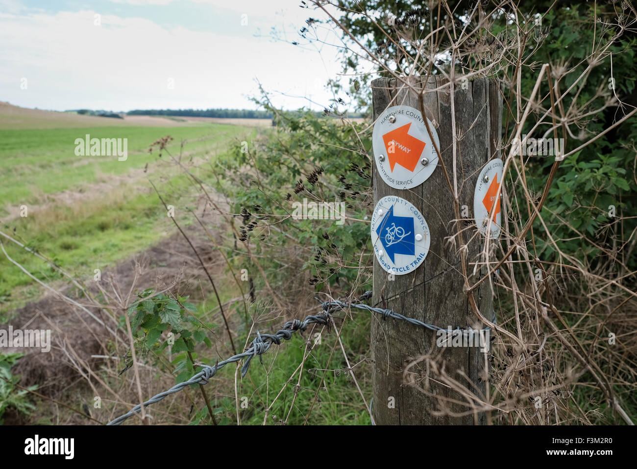 Byway and footpath signs on a post in a field Stock Photo - Alamy
