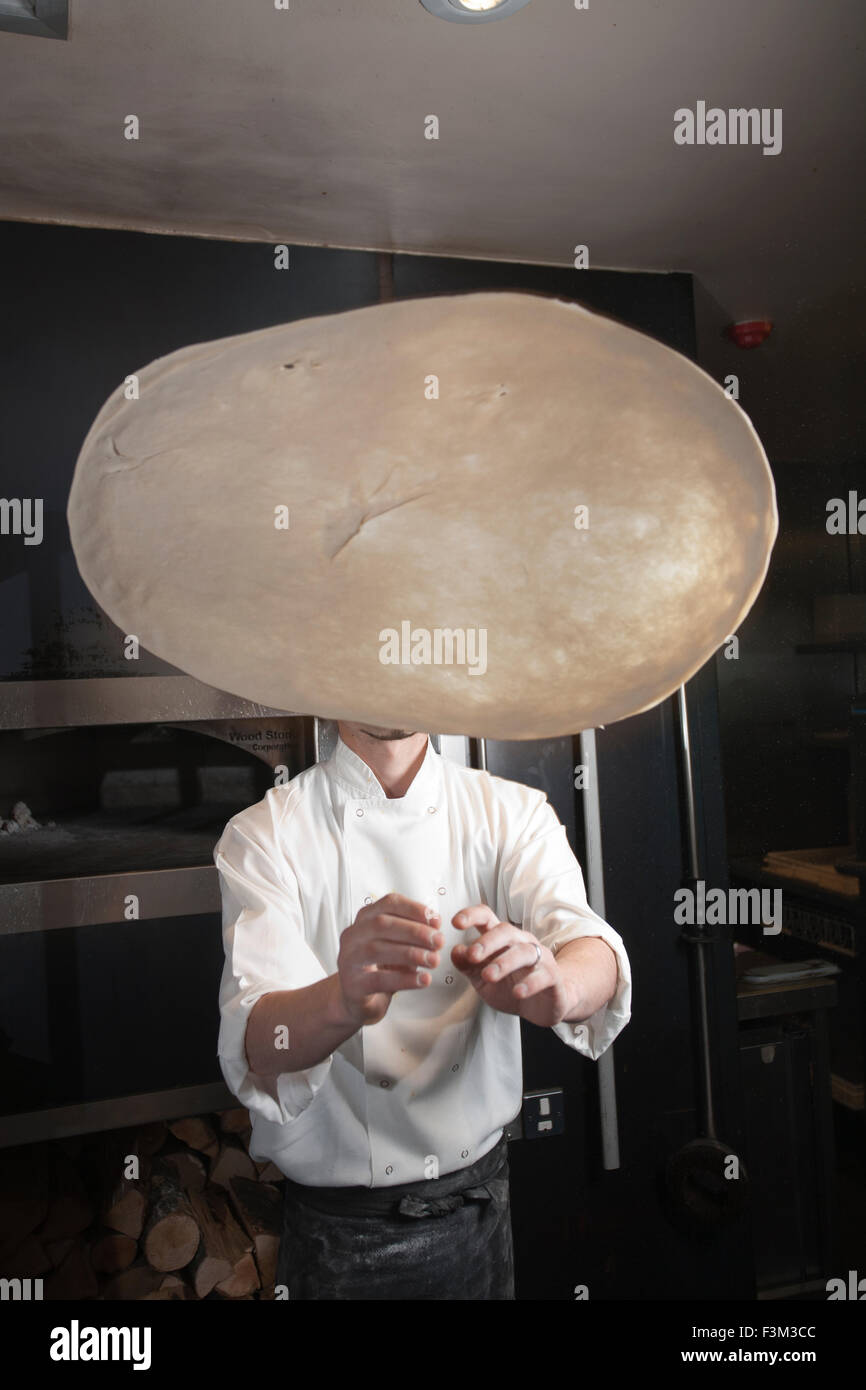 Tossing pizza dough hi-res stock photography and images - Alamy