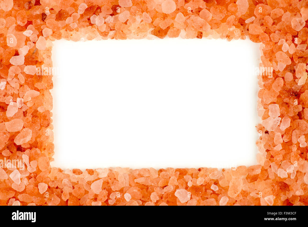 Stylish himalayan rock salt frame with aerial white copyspace Stock ...