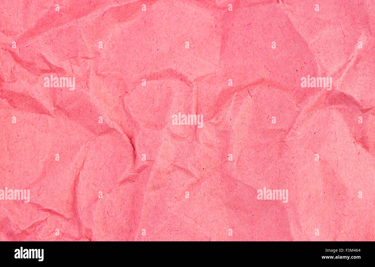 Crumpled recycled red paper background texture Stock Photo - Alamy