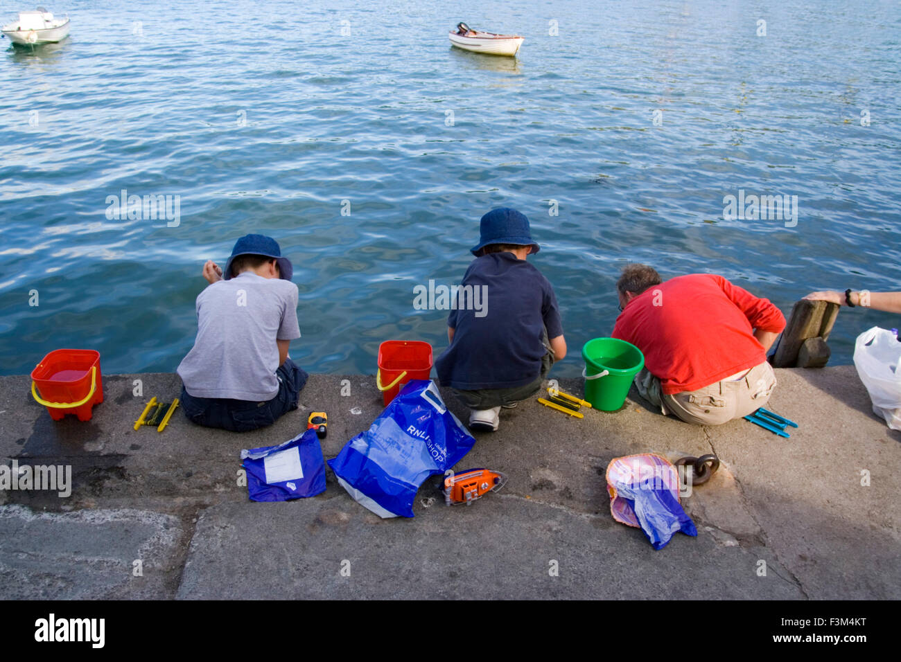 Fishing for crabs, Salcombe, South Devon, UK Stock Photo - Alamy