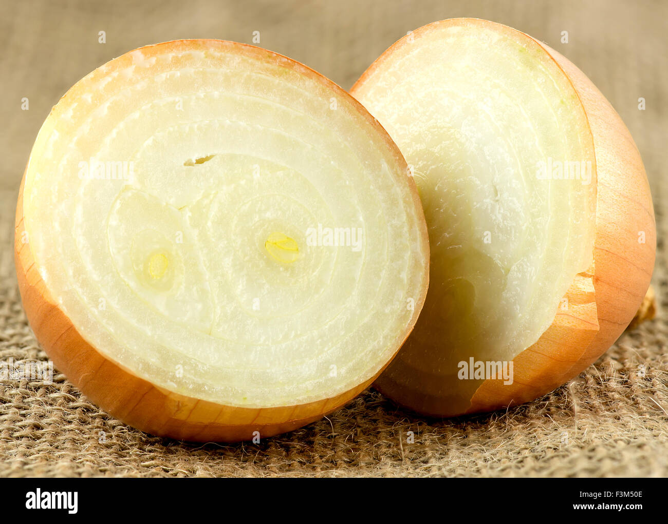Closeup macro of onion cut in half Stock Photo - Alamy