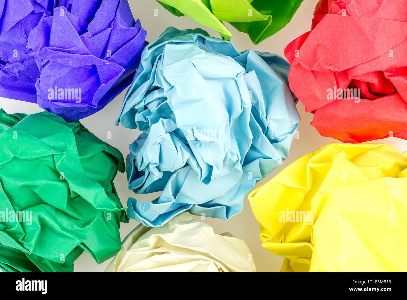 Multicolored crumpled balls of paper Stock Photo - Alamy
