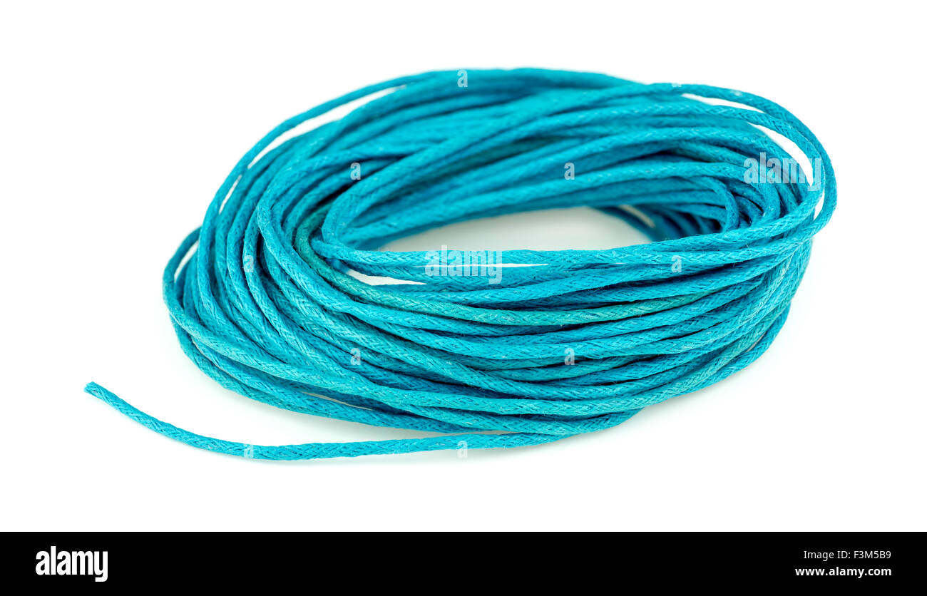Blue twine in a bunched loop isolated on white Stock Photo - Alamy