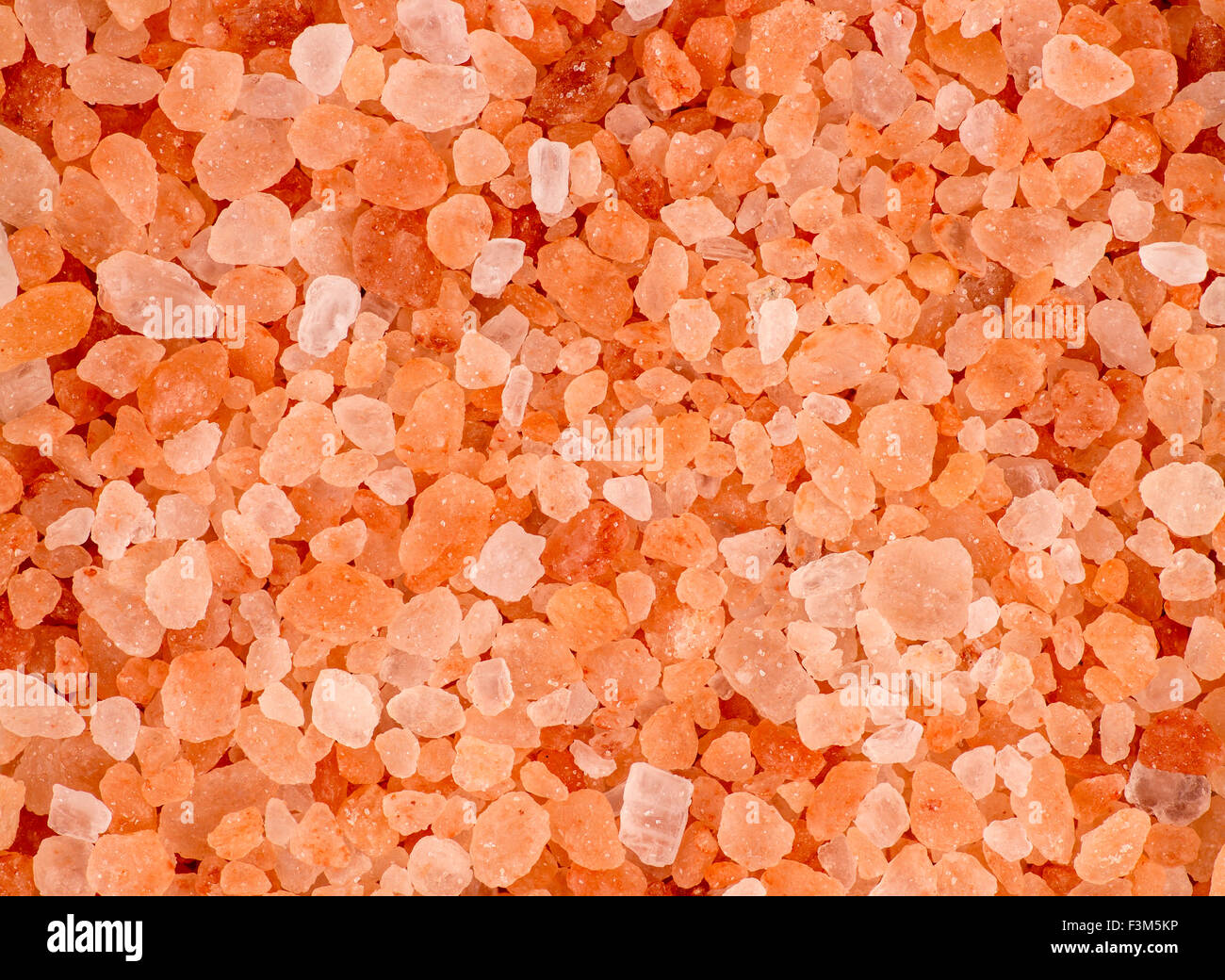 Aerial background macro texture of pink red himalayan salt Stock Photo ...