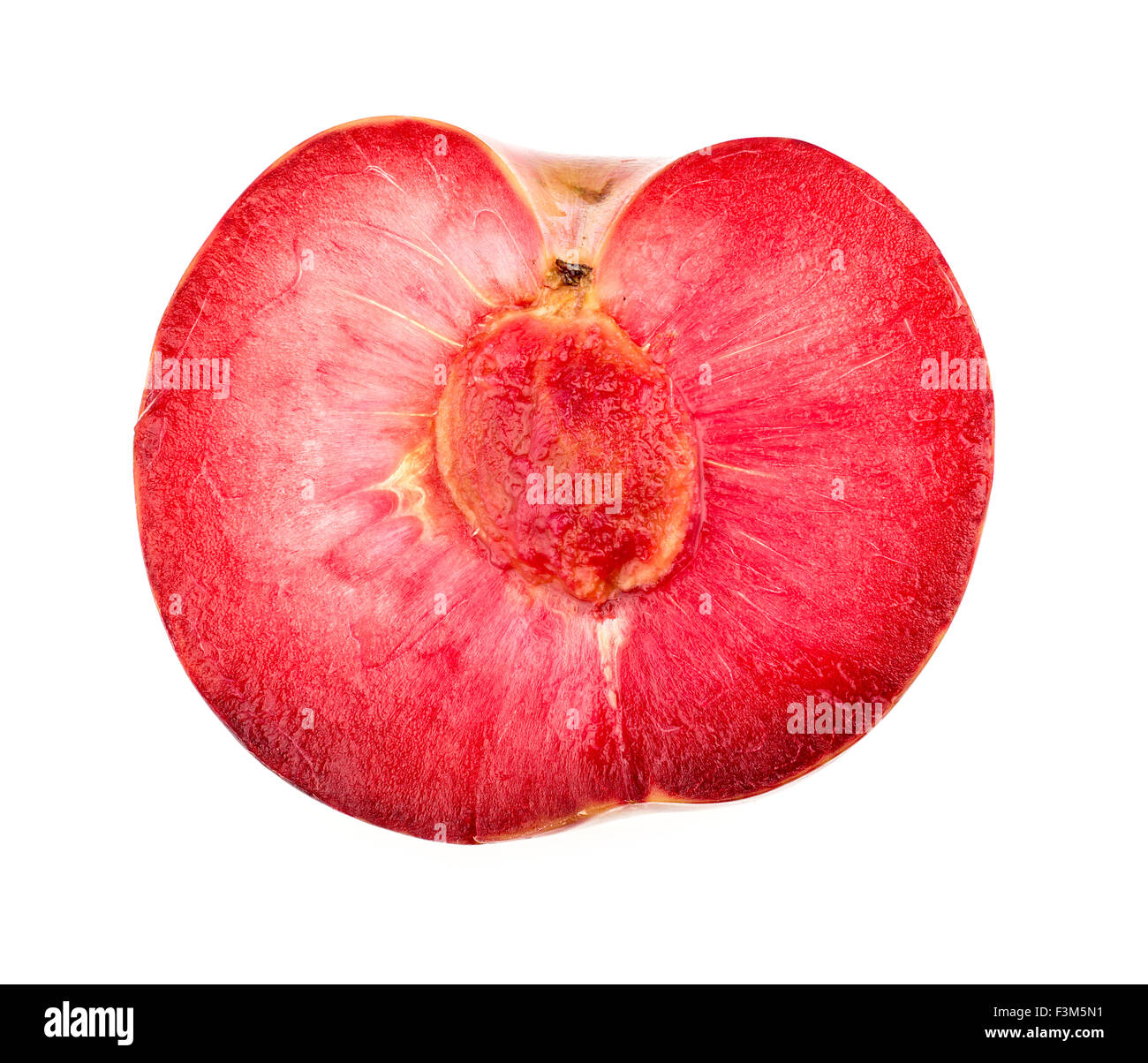 Vibrant, tasty, juicy red cross section of pluot fruit isolated on ...