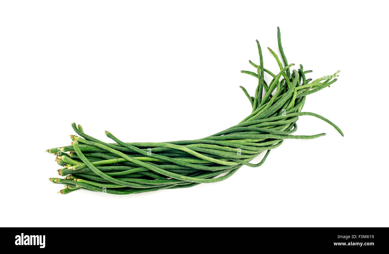 Bunch of long snake beans isolated on white background Stock Photo - Alamy