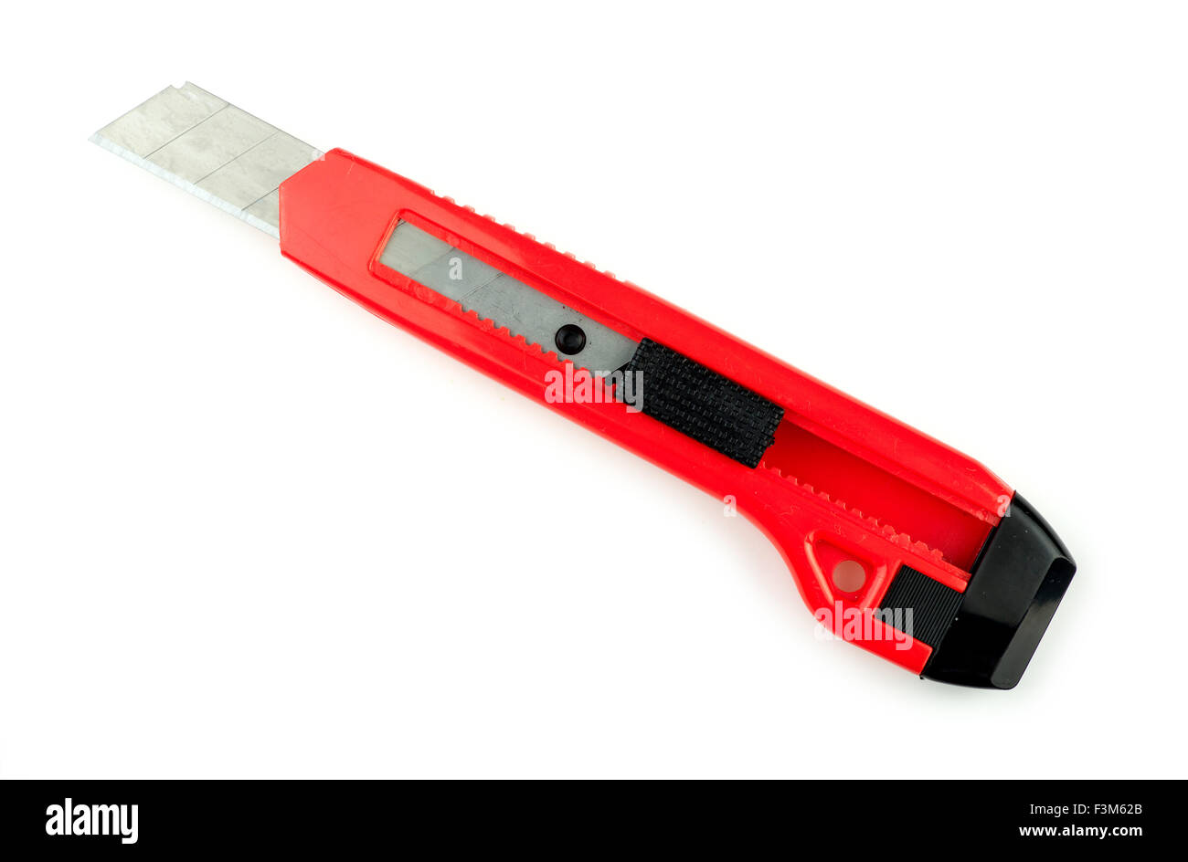 Used office knife isolated on white background Stock Photo - Alamy