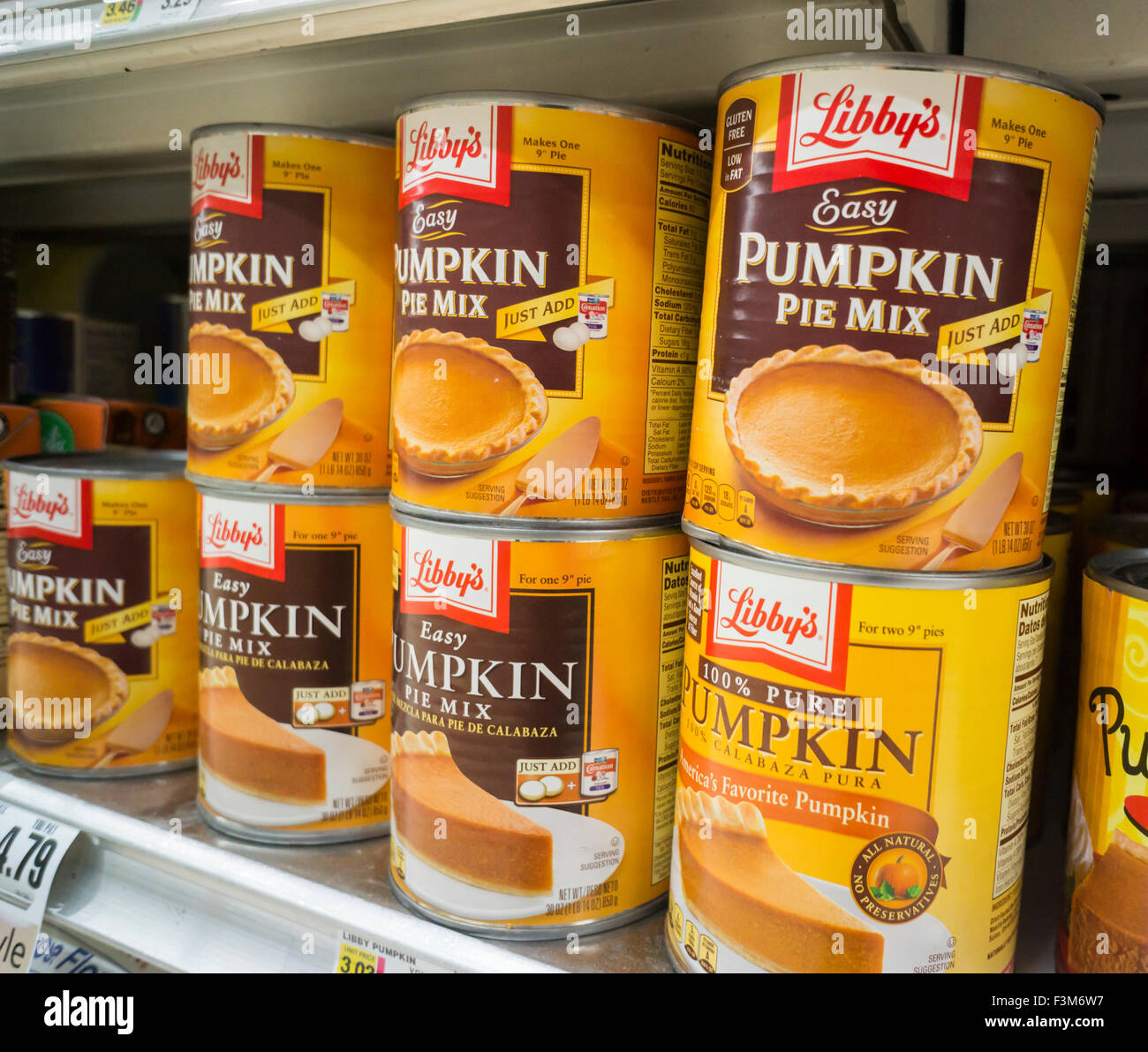 Cans of Libby's Pumpkin Pie mix and fillings on the shelves of a ...