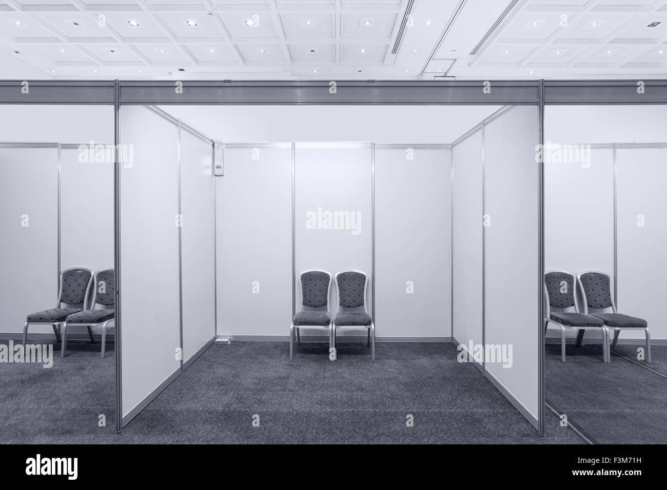 Booth with lighting inside the Trade show pavilion Stock Photo - Alamy