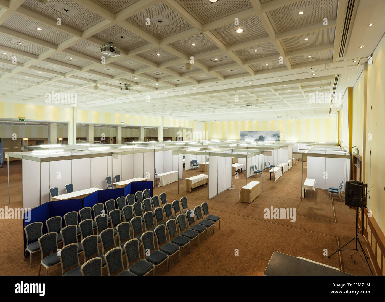Trade show interior with booth and tables Stock Photo - Alamy