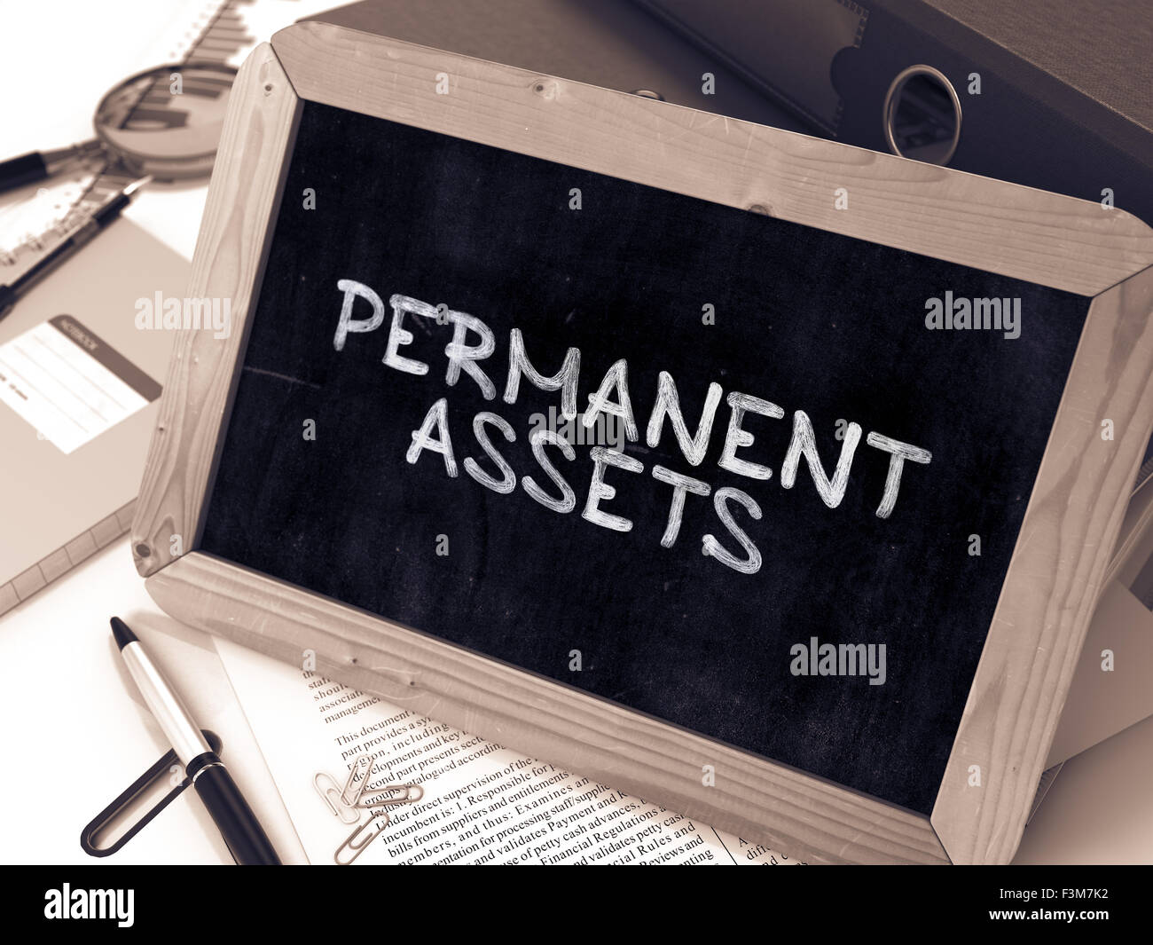Permanent Assets - Chalkboard with Hand Drawn Text Stock Photo - Alamy