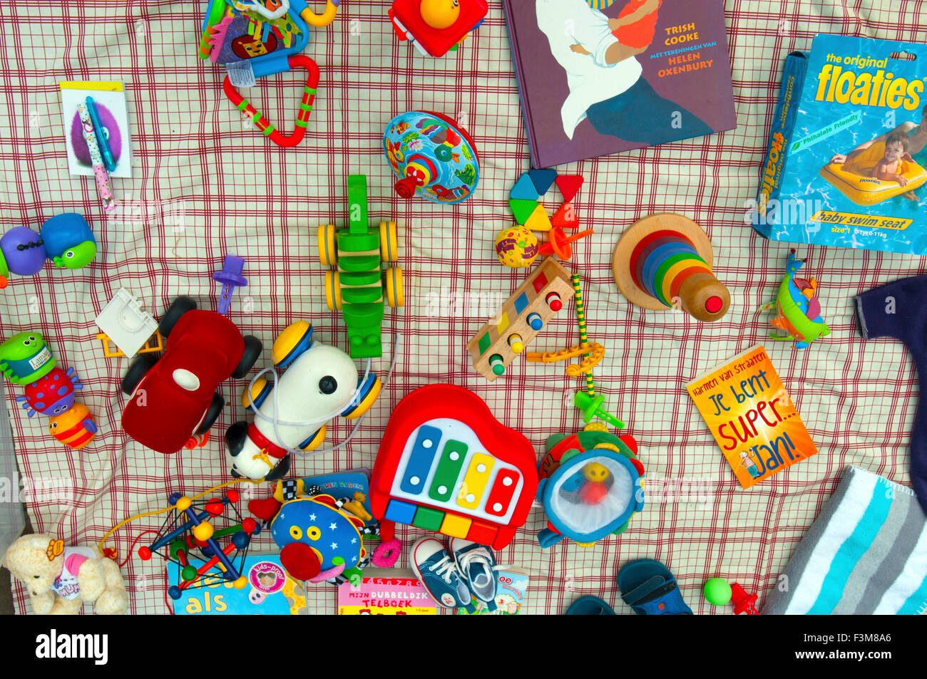 Assorted items in close up at flea market Kings Day The Netherlands ...