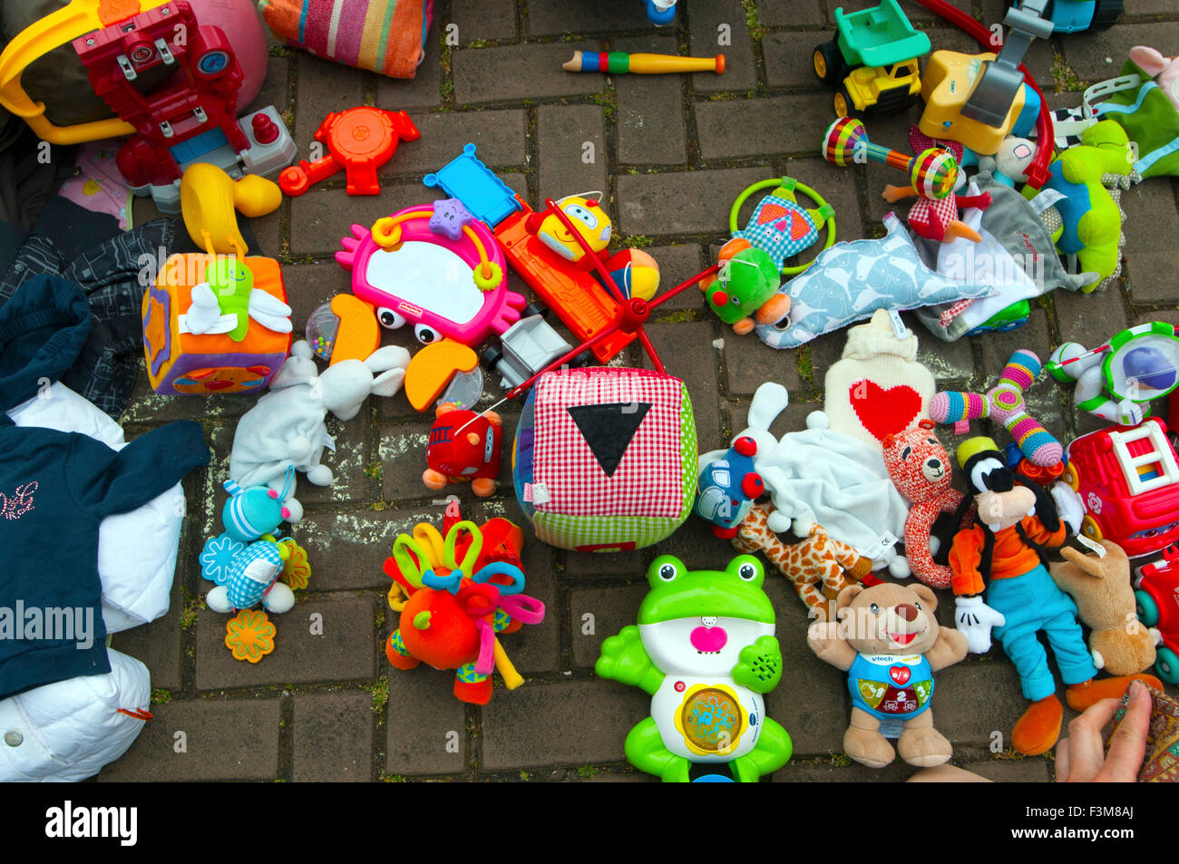 Assorted items in close up at flea market Kings Day The Netherlands ...