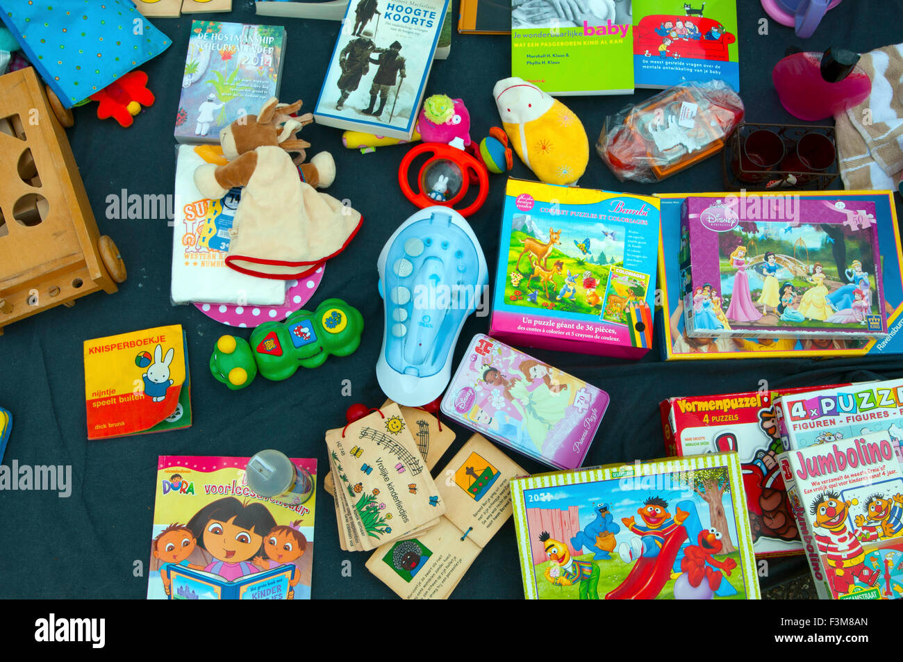 Assorted items in close up at flea market Kings Day The Netherlands ...