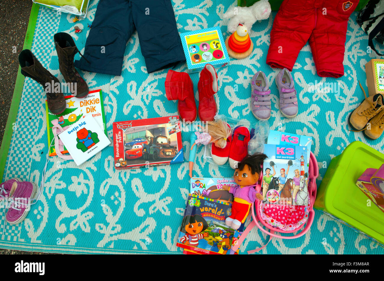 Assorted items in close up at flea market Kings Day The Netherlands ...
