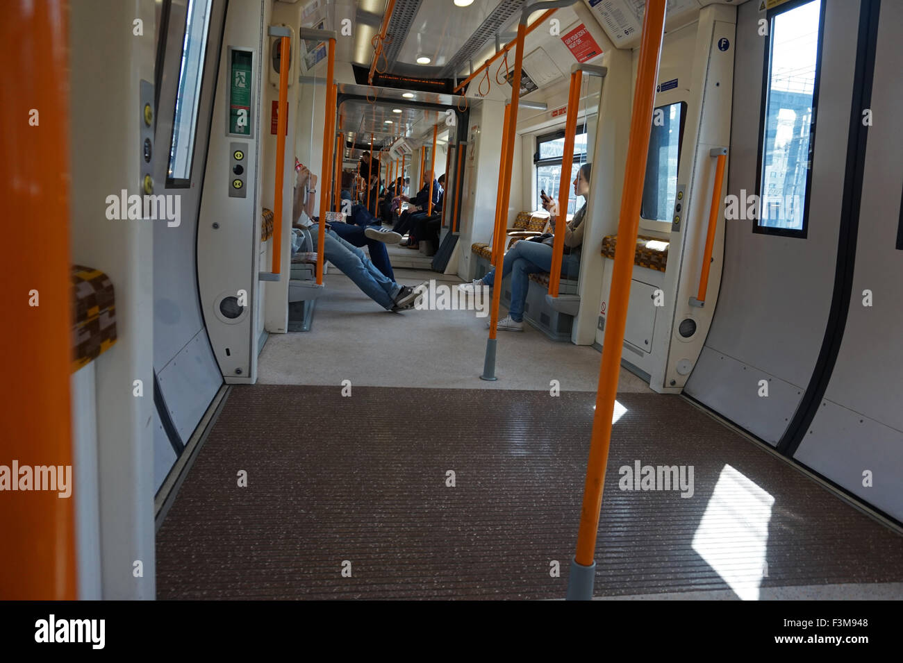 Passengers on board the Overground train, London, England Stock Photo ...