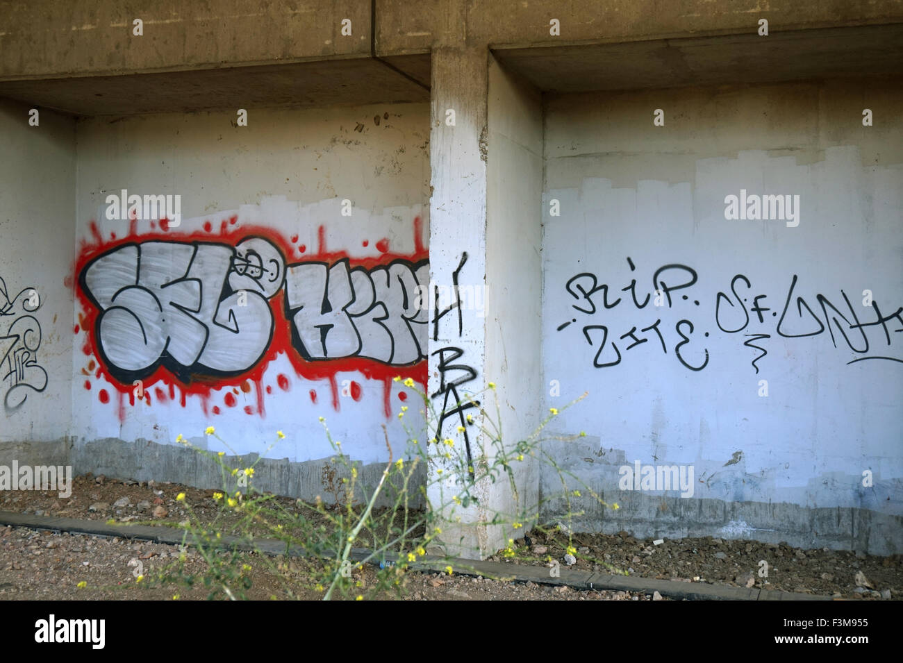 New graffiti painted on whitewash which was painted over old graffiti ...