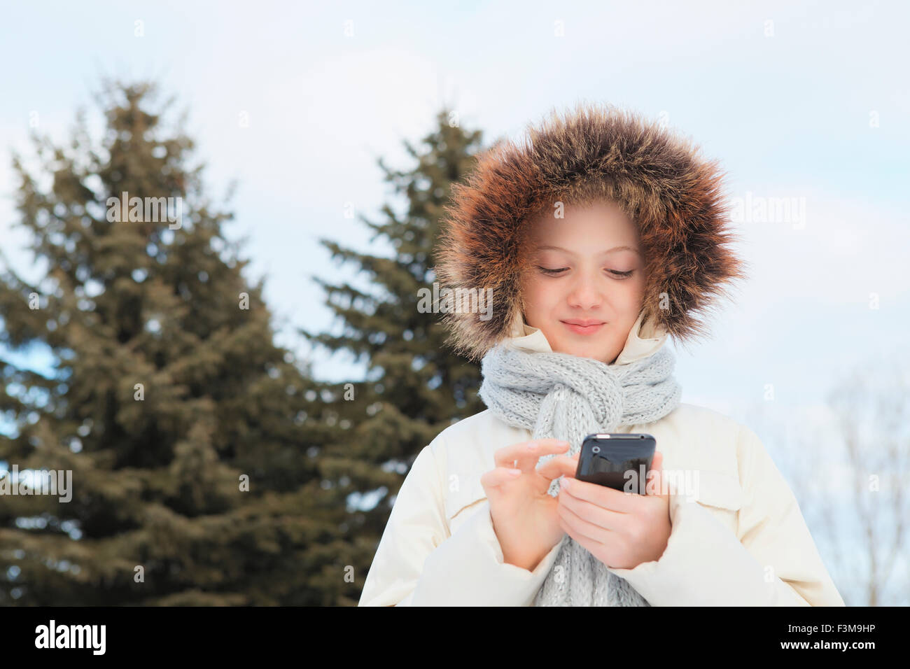 Winter,Hood,Teenage Girl,Texting,Smart Phone Stock Photo - Alamy