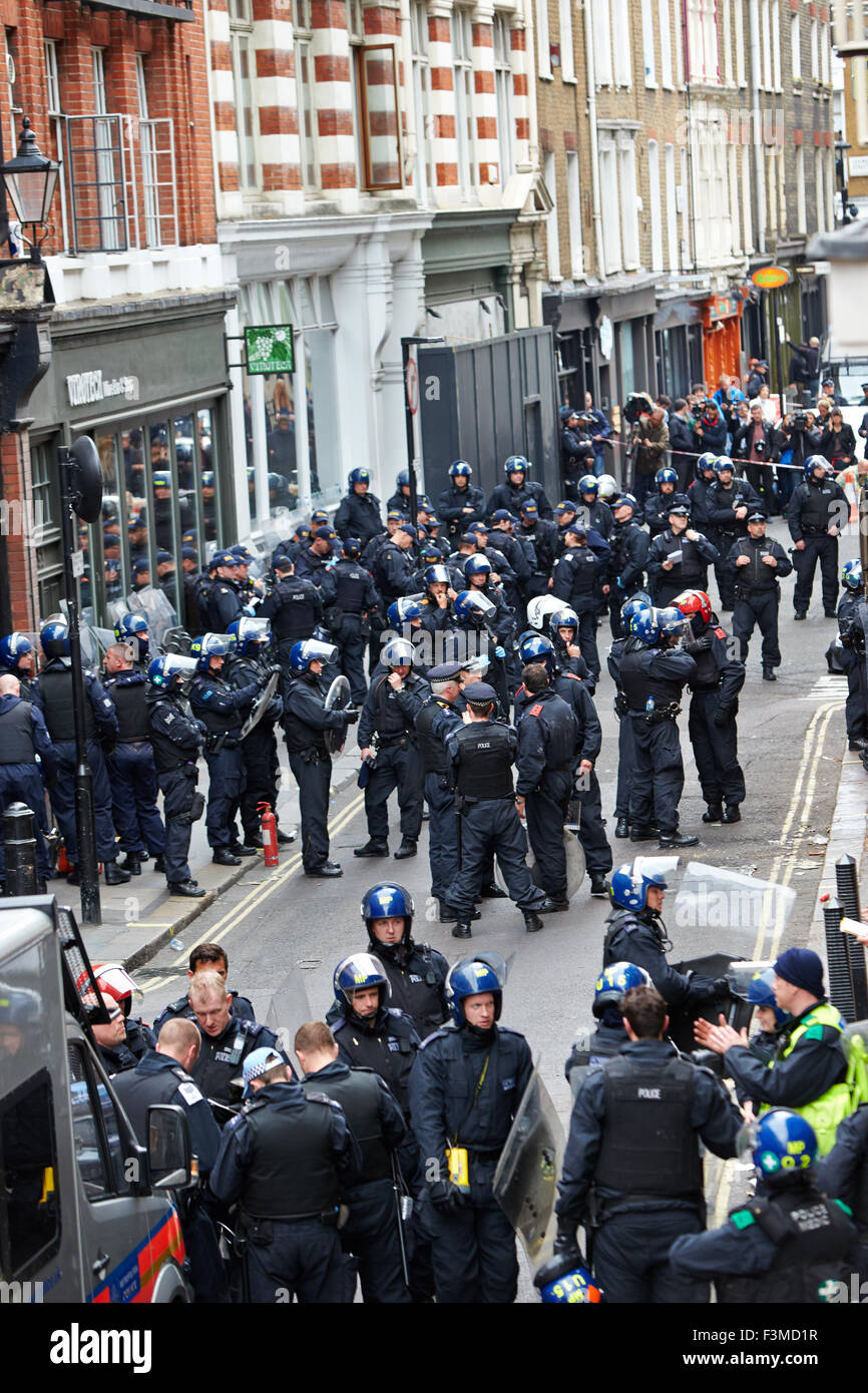 Police officers in Beak Street, where a squat was raided earlier in the ...